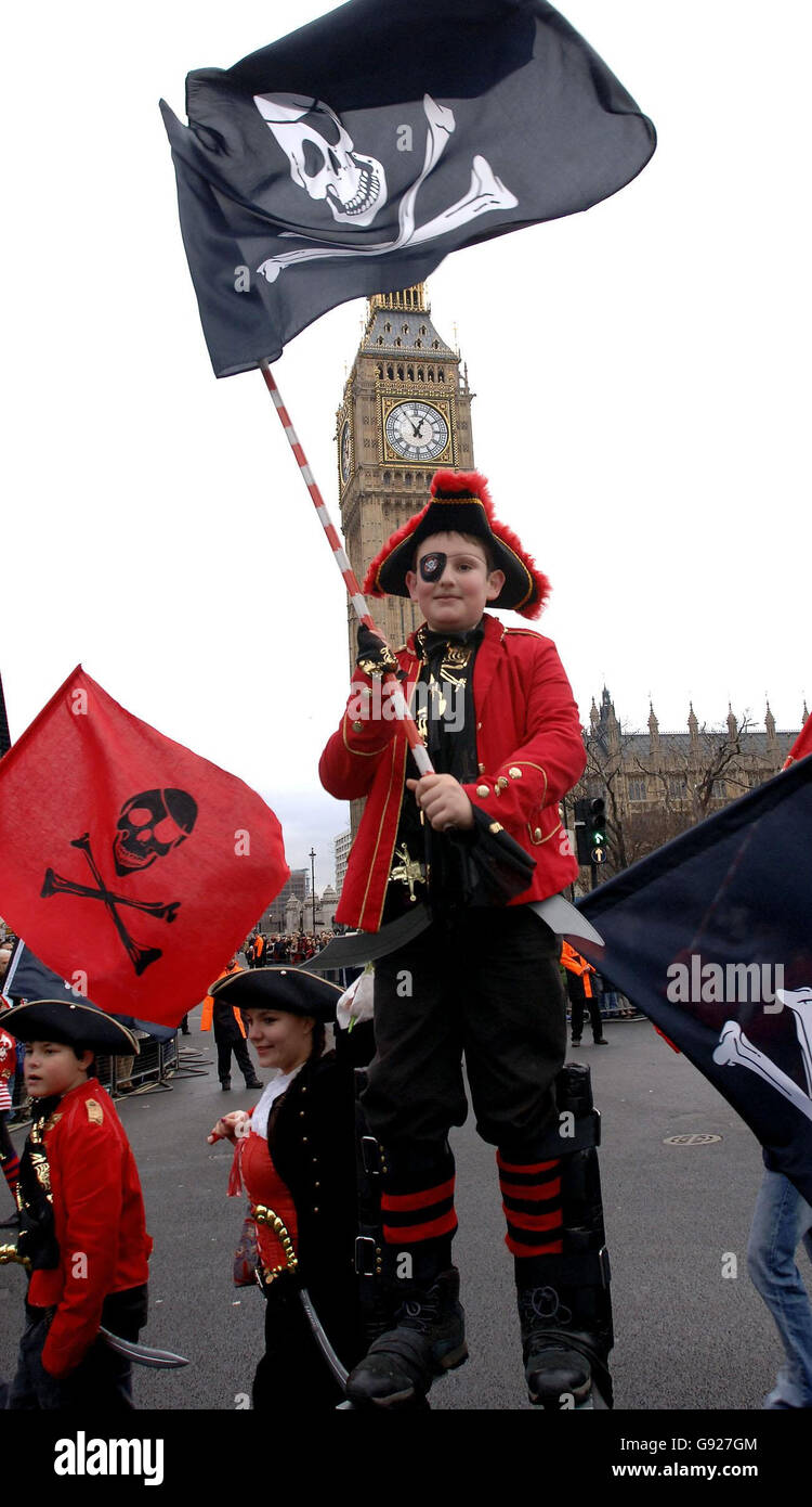 A young Pirate on stilts makes his way around Parliament Square, in the ...