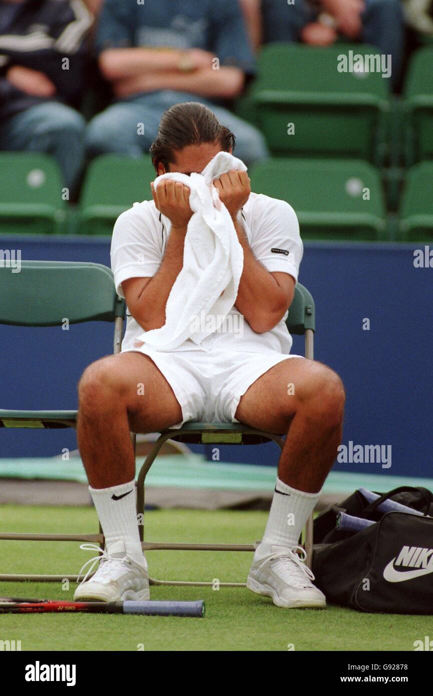 Tennis - Nottingham Open 1998. Marcelo Rios looks dejected after losing ...