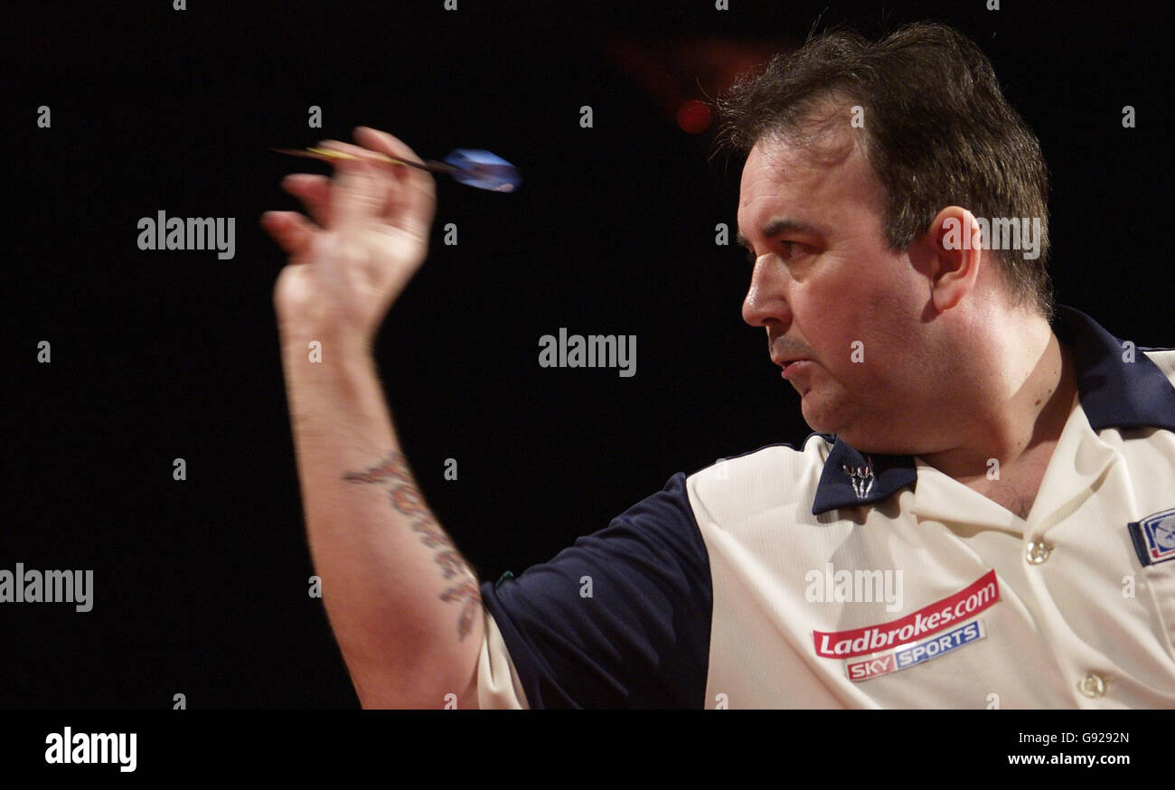 England's Phil Taylor in action against England's Peter Manley during ...