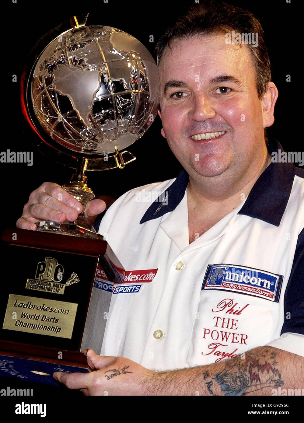 Pdc darts world championship trophy hi-res stock photography and images ...
