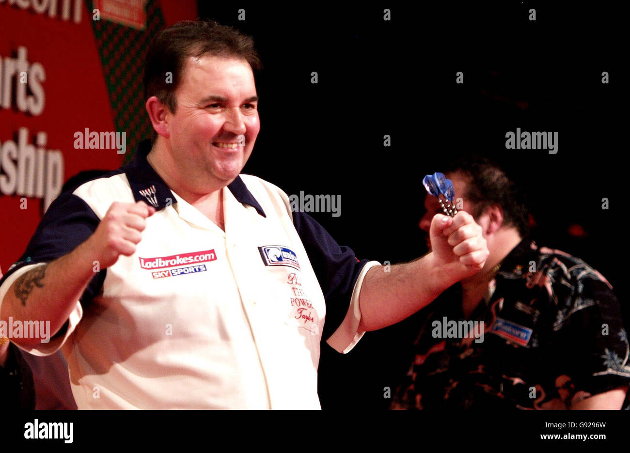 England's Phil Taylor celebrates winning the Ladbrokes.com World Darts ...