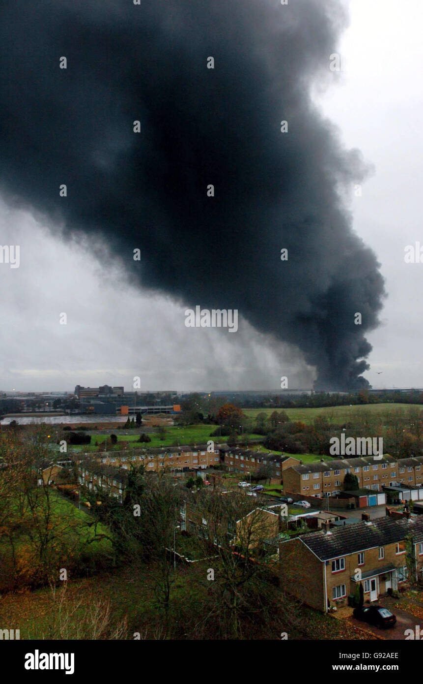 Smoke continues to billow Monday December 12, 2005, from the Buncefield ...