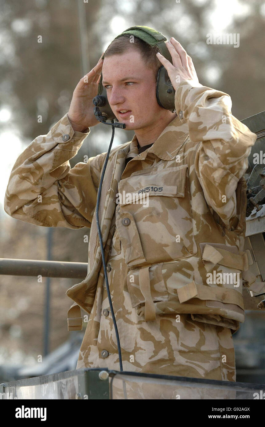 Highlander Kris Phillips from Tain, Rosshire, adjusts his headset on a ...