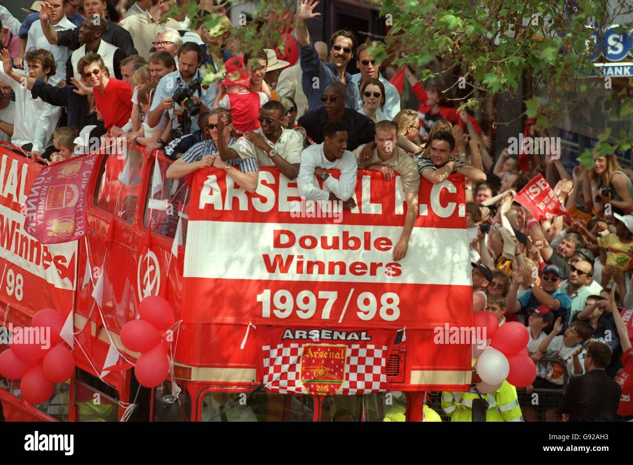 Arsenal's double winning team parade through Islington in north London ...
