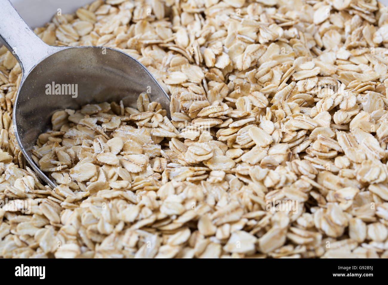 Healthy raw oats with scoop Stock Photo - Alamy