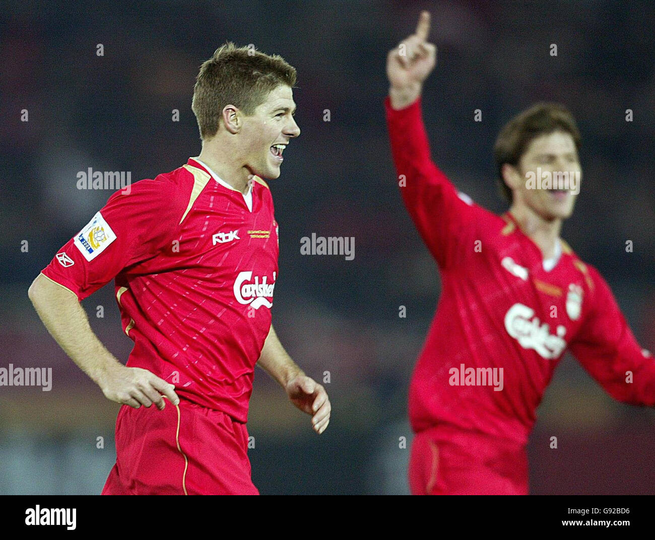 Liverpool's Steven Gerrard (L) celebrates his goal with team mate Xabi ...