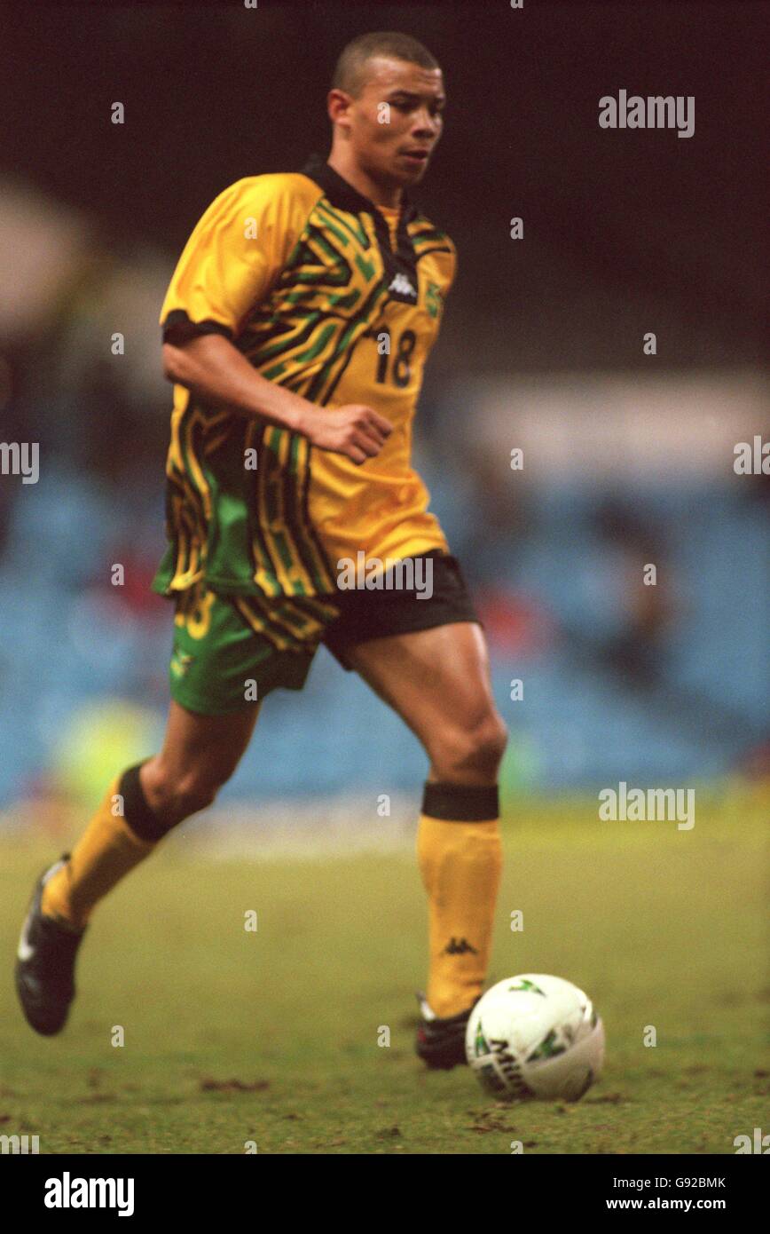 Jamaicas deon burton in action on the ball hi-res stock photography and ...