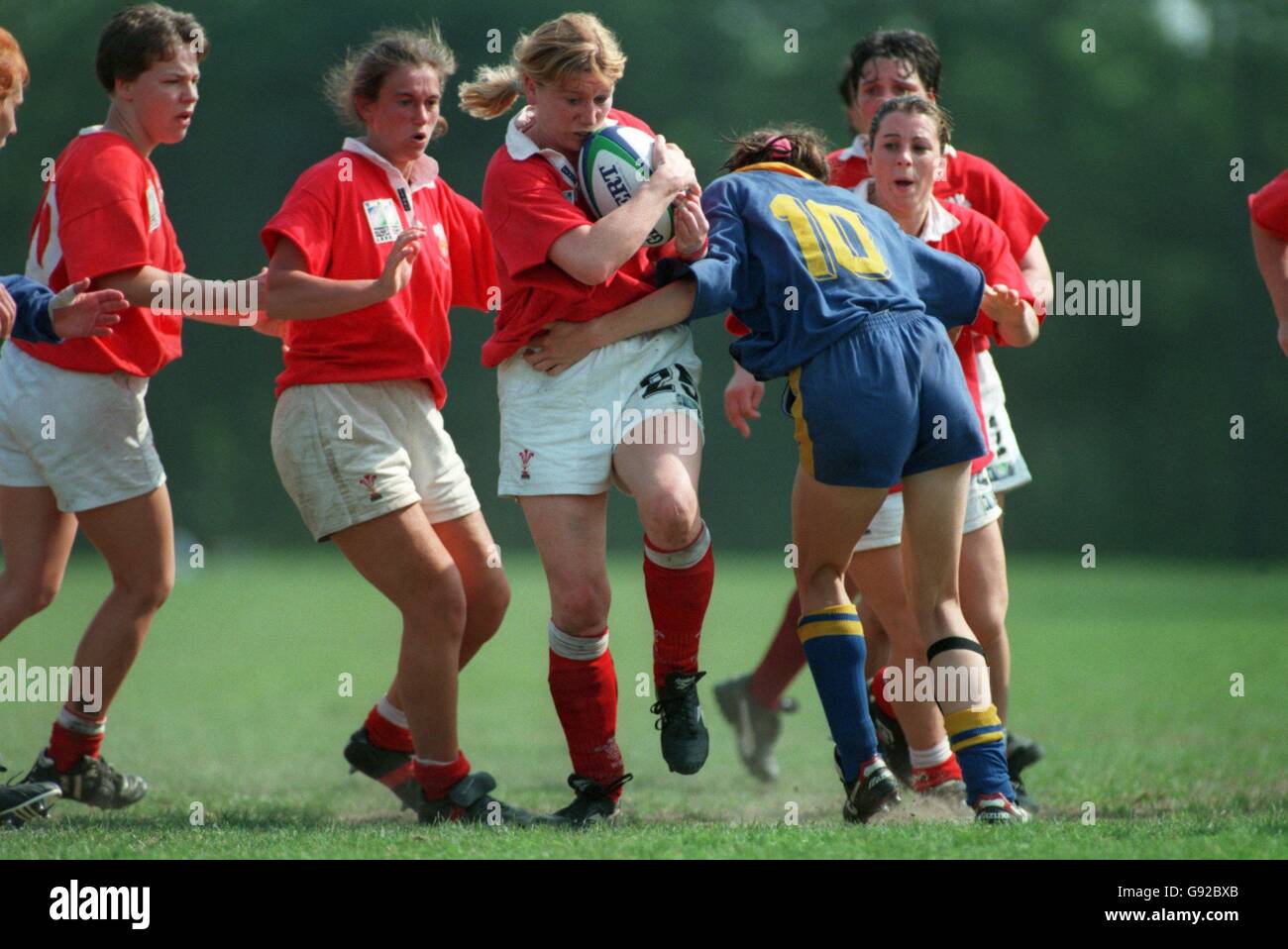 Kazakhstan's Alifya Tamaeva tries to tackle Wales' Pip Evans as she ...