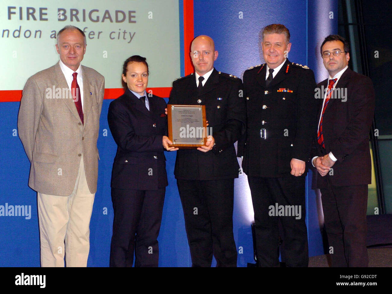 Mayor of London Ken Livingstone and Phil Woolas MP (right) stand with ...