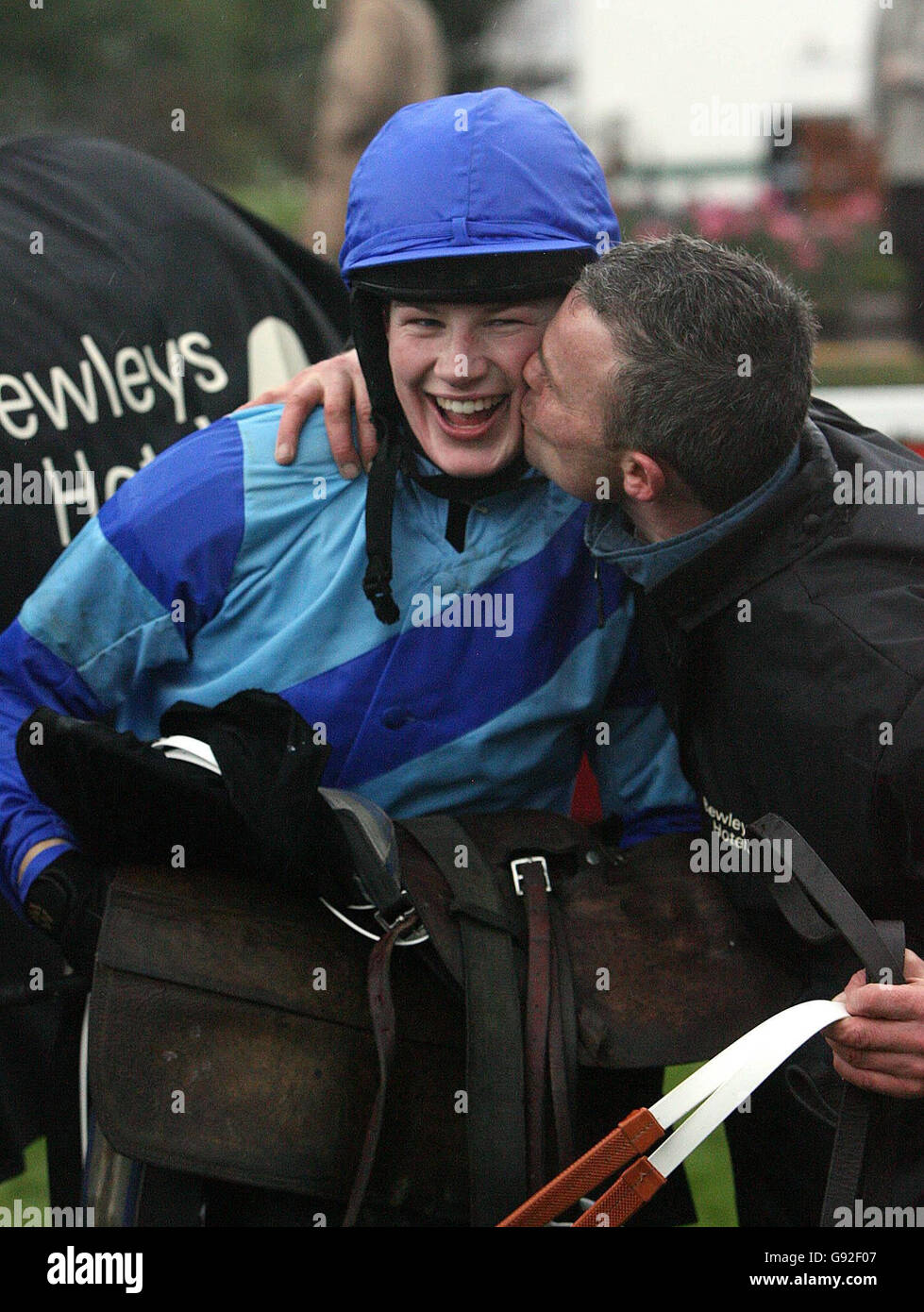 Nina Carberry is kissed by trainer Adrian Maguire after she won the the ...