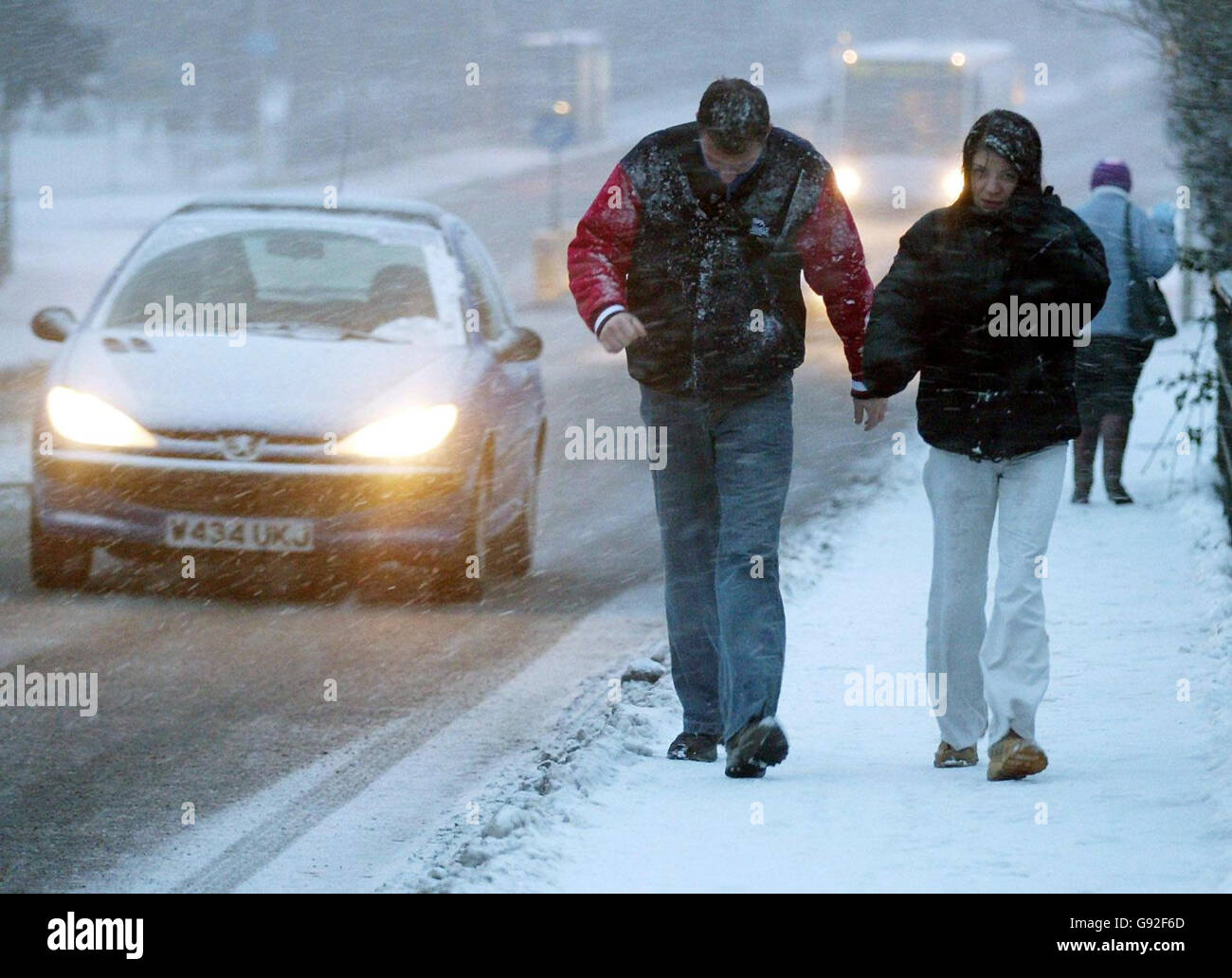 People battle against the elements in Ashford, Kent, Friday December 30 ...