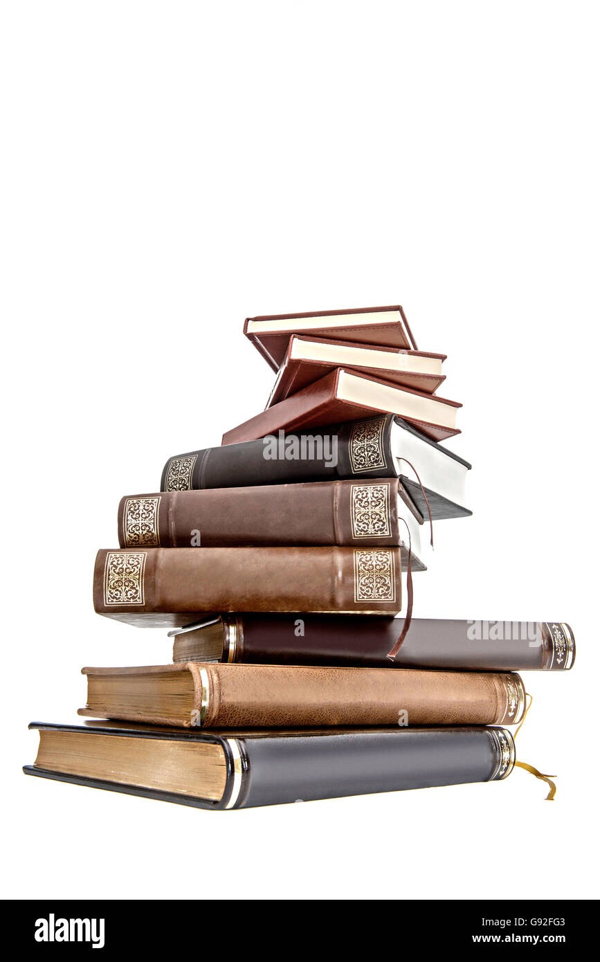 Big stack of old antique books isolated on white background Stock Photo ...