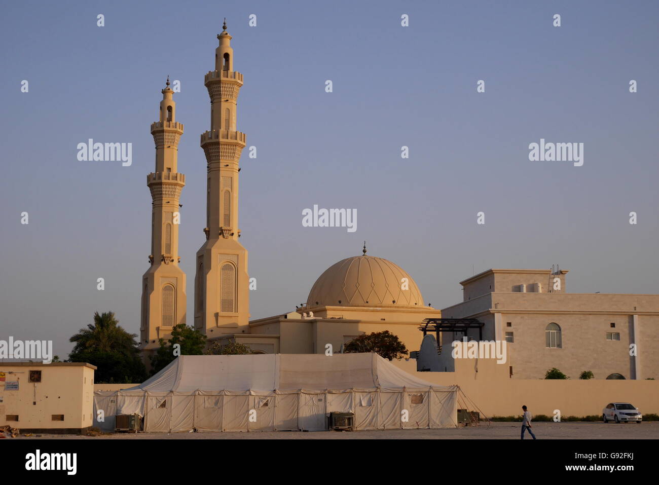 Exterior view of Saar Mosque with a Ramadan tent before, Saar, Kingdom ...