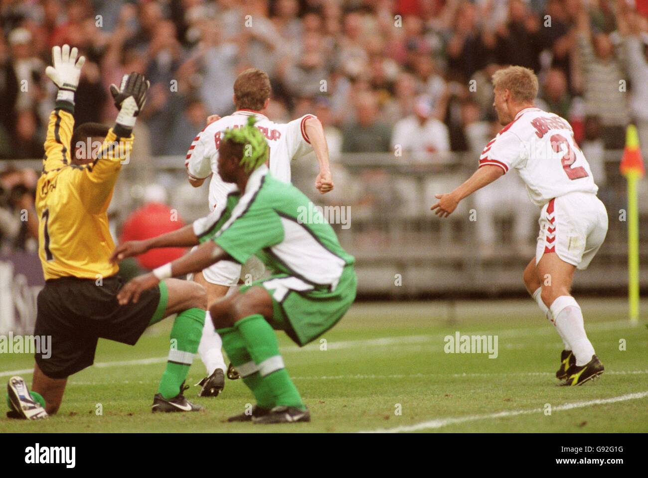 Nigeria's Peter Rufai (left) and Taribo West (centre) look at each ...