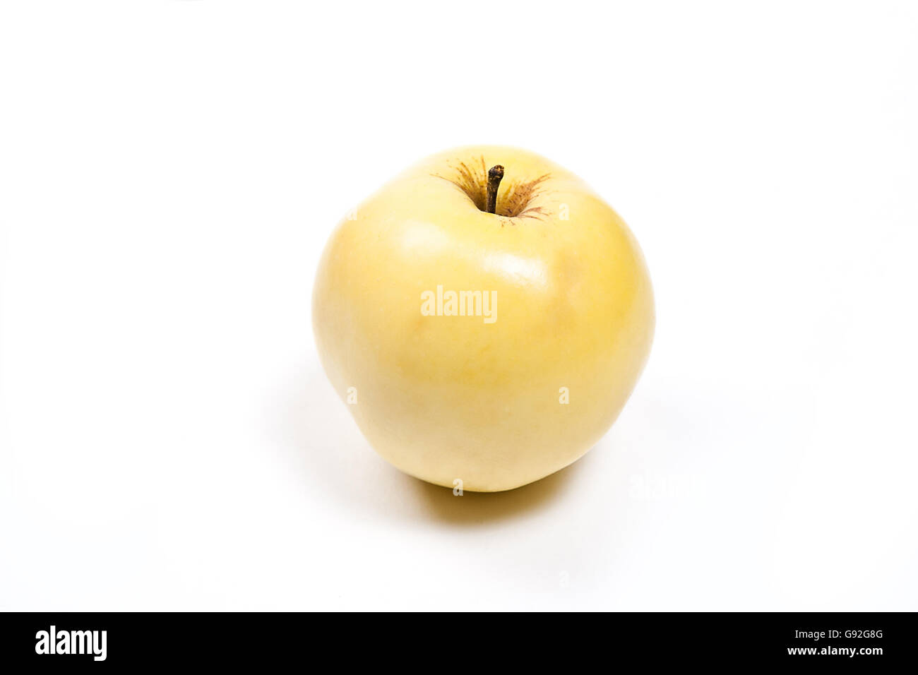 Single fresh yellow apple. Isolated on white background Stock Photo - Alamy