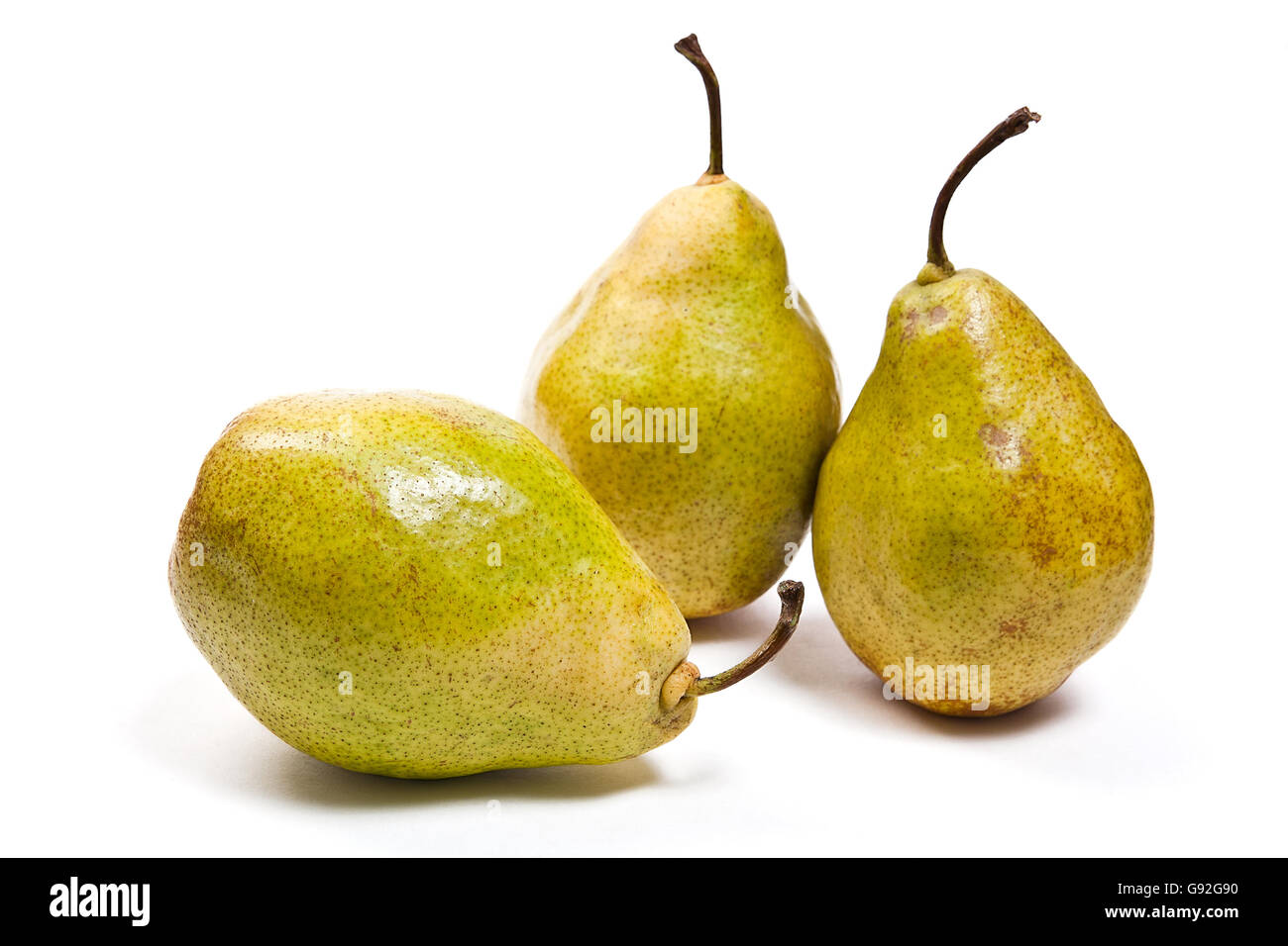 Three fresh green pears. Group of juicy ripe fruits. View of conference ...