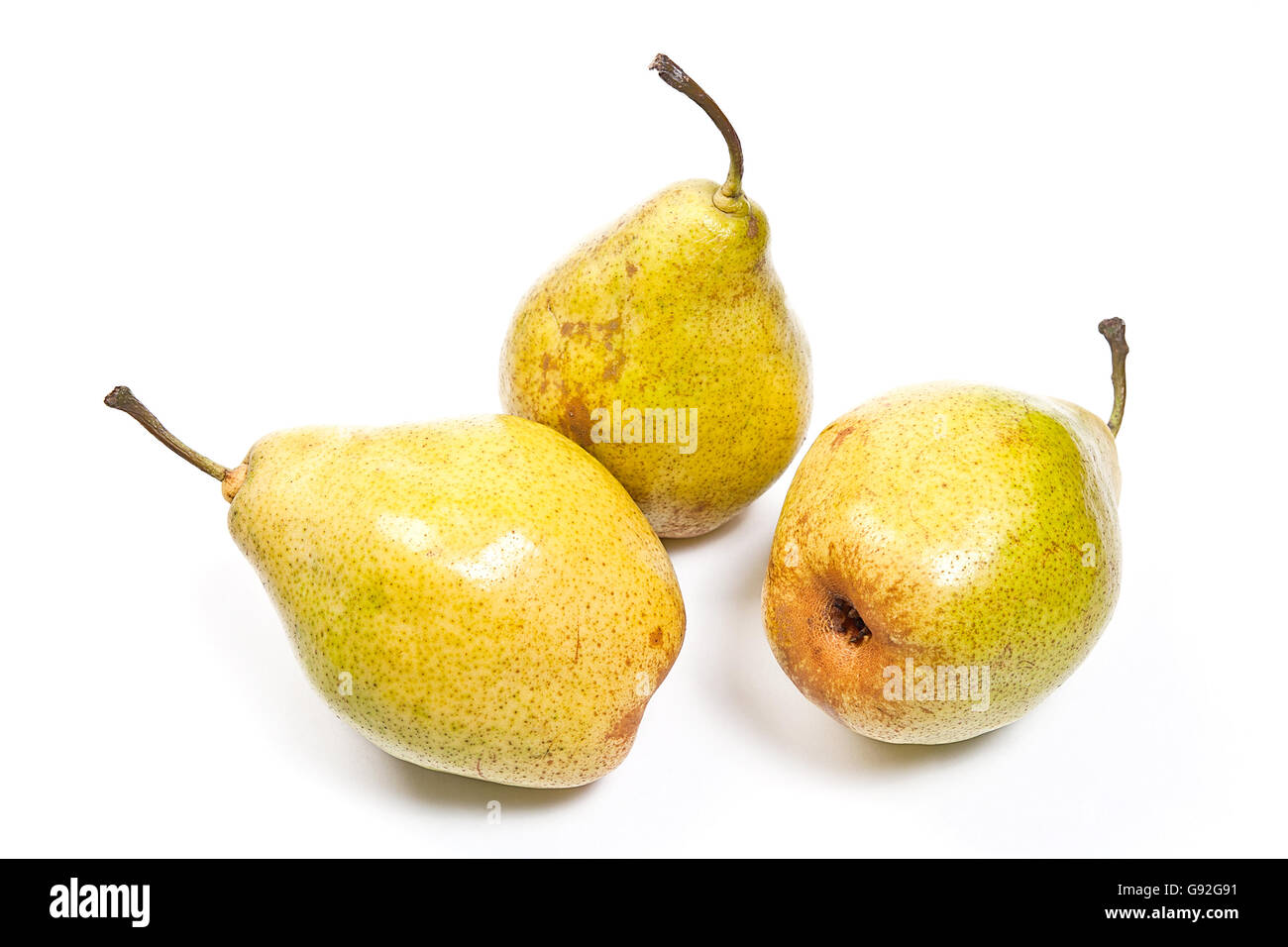 Three fresh green pears. Group of juicy ripe fruits. View of conference ...