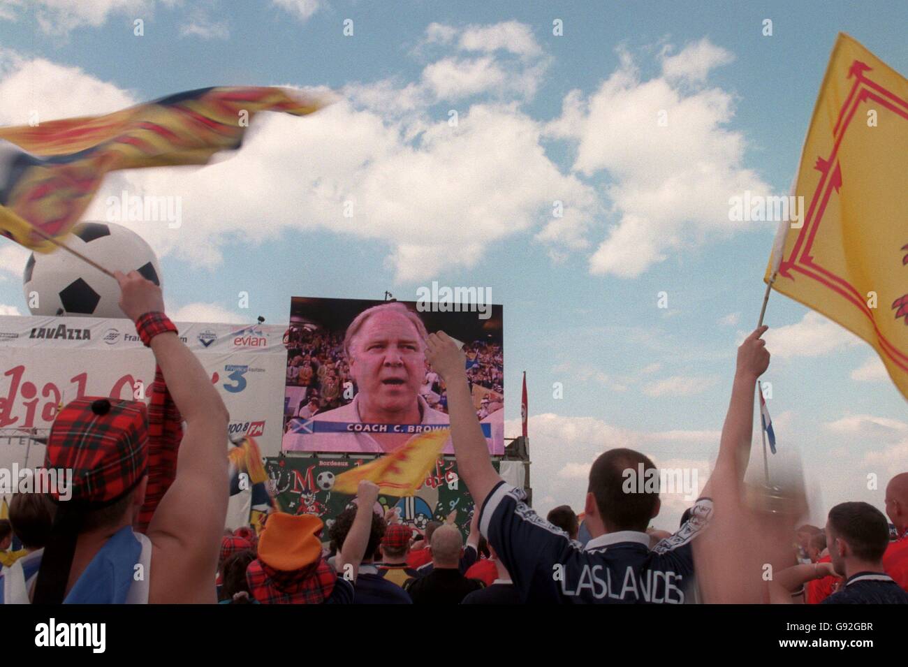Scotland fans cheer the Scotland coach Craig Brown on a big screen in ...