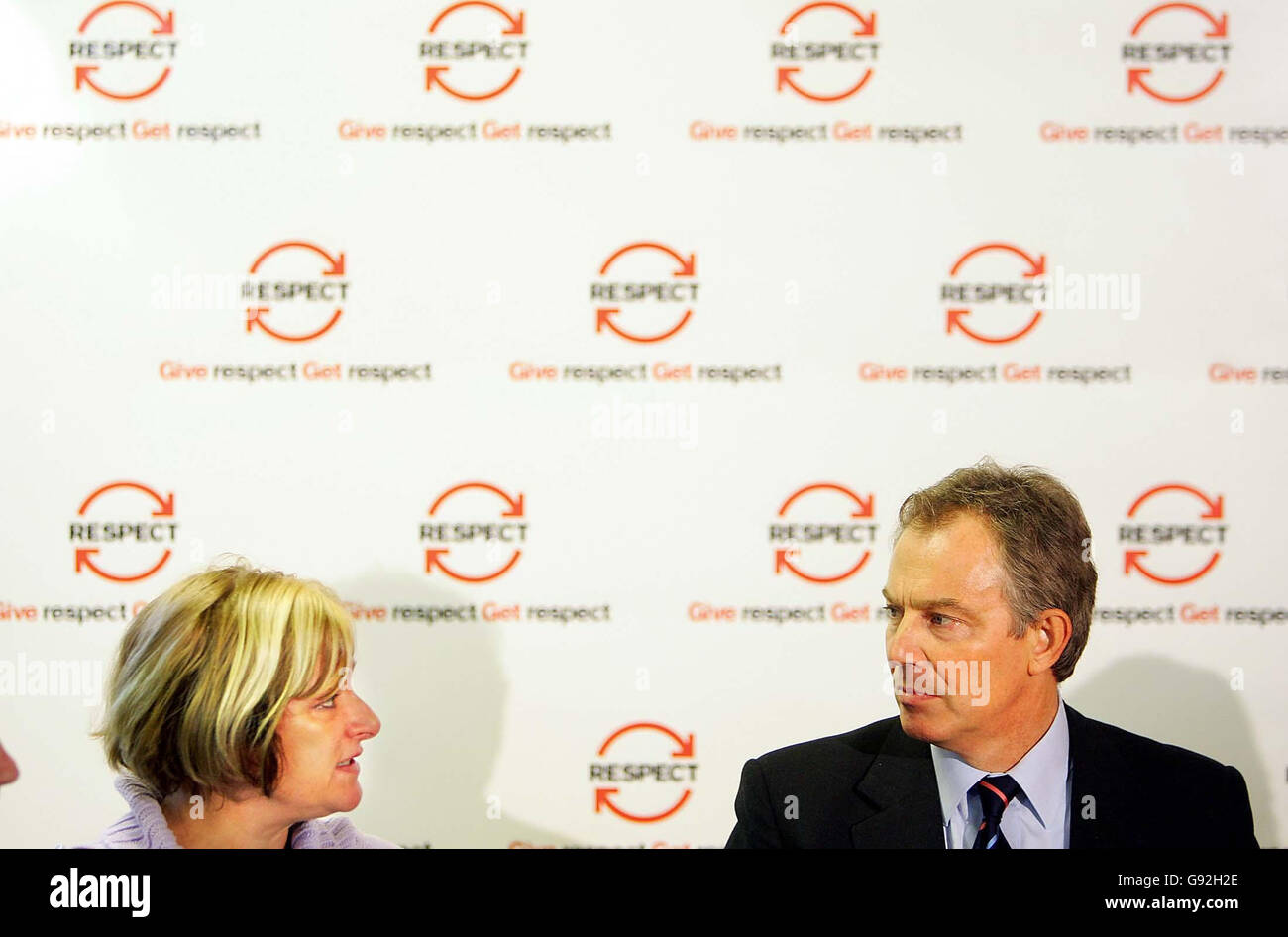 British Prime Minister Tony Blair talks with a local resident during a ...