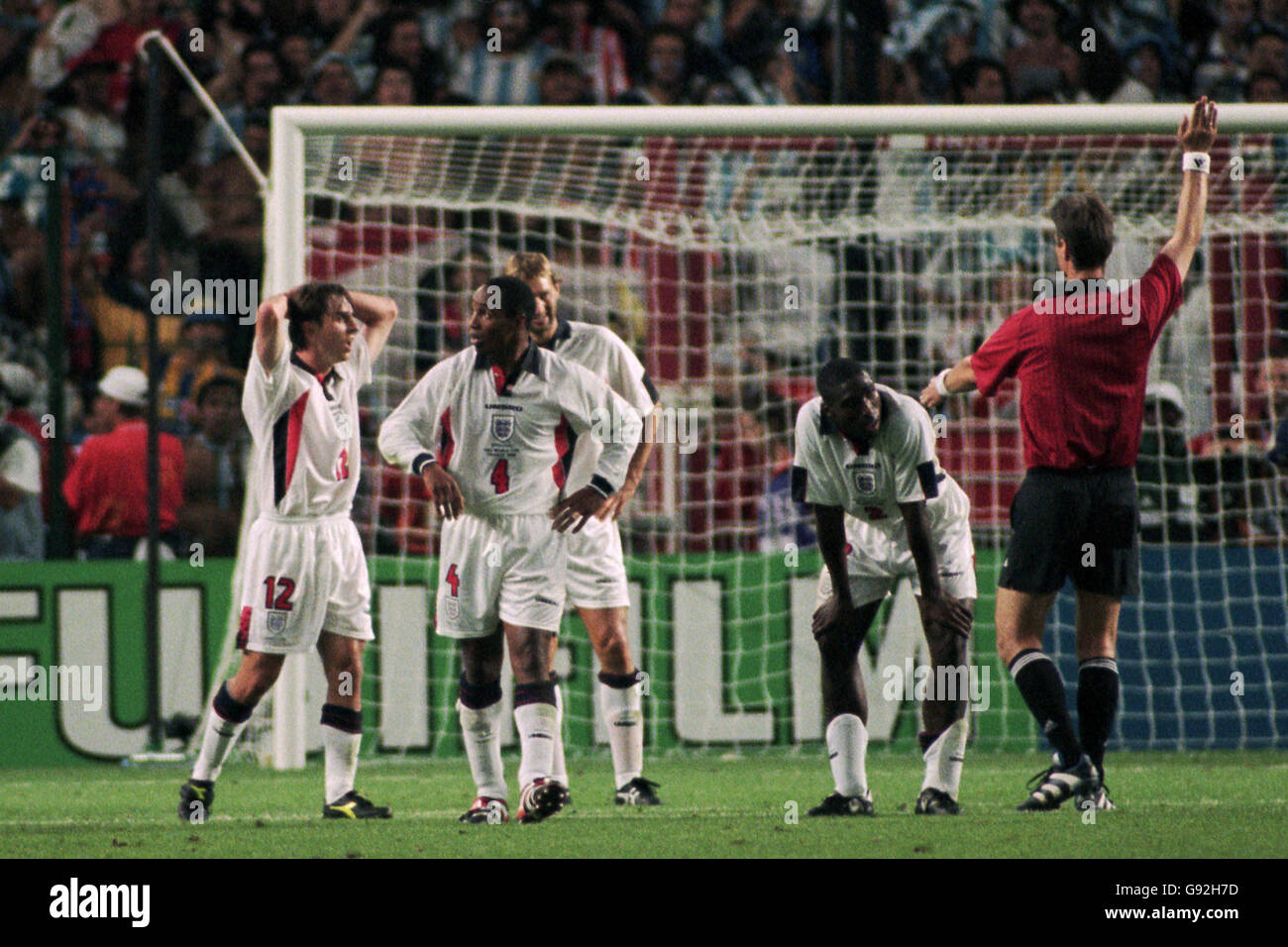 Referee Kim Milton Nielsen (right) disallows Sol Campbell's headed goal ...