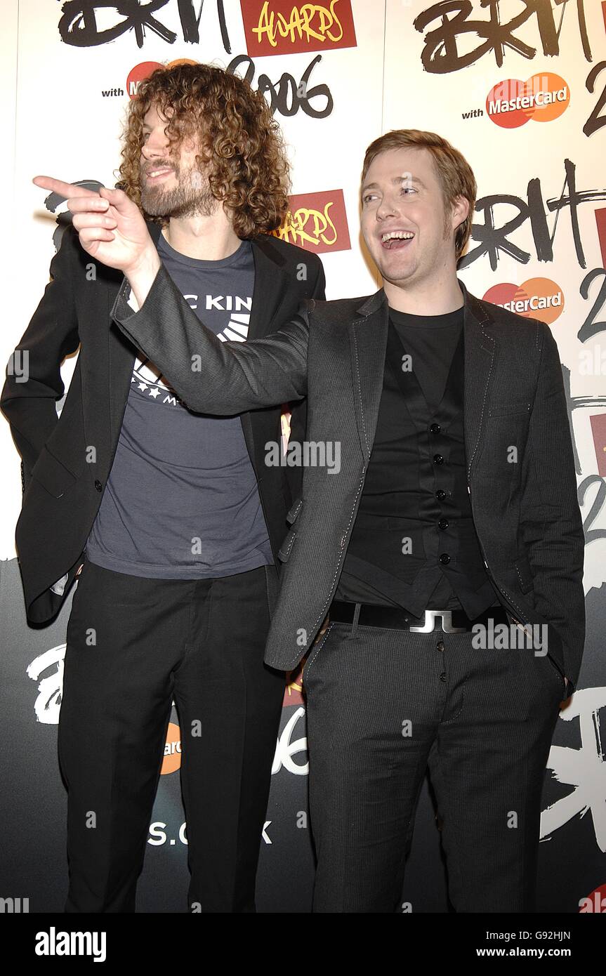 Simon Rix (L) and Ricky Wilson of the Kaiser Chiefs at the BRIT Awards ...