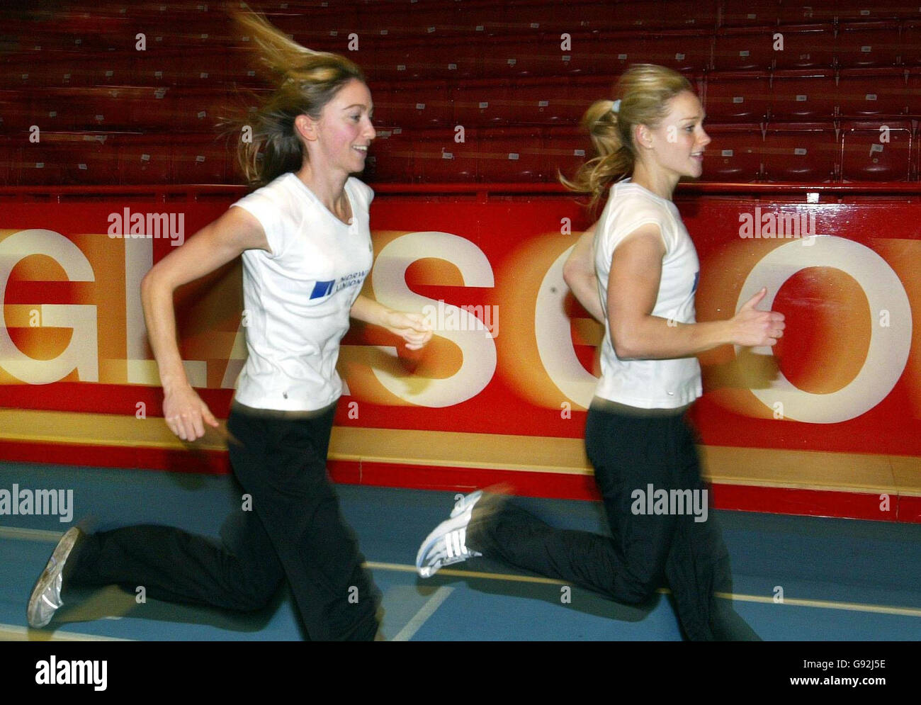AAA 200m indoor champion Susan Deacon (R) and AAA 1500m indoor champion ...
