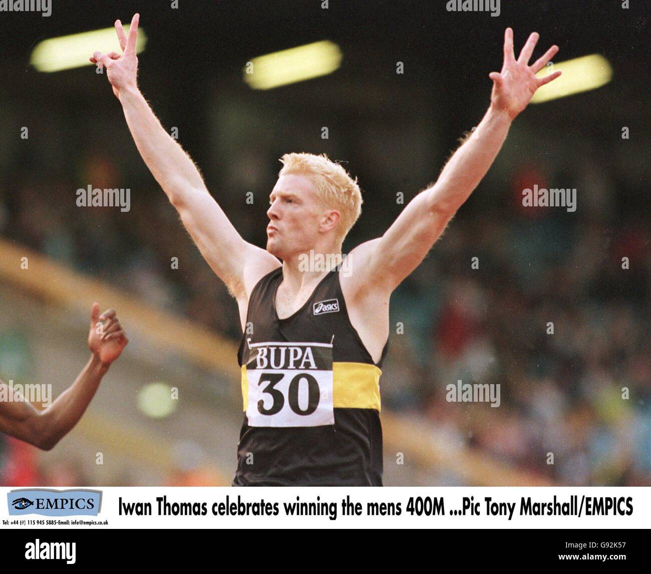 Iwan thomas celebrates winning mens 400m hi-res stock photography and ...