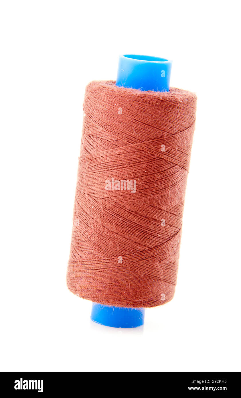 Brown Bobbin Roll on White Stock Photo - Alamy