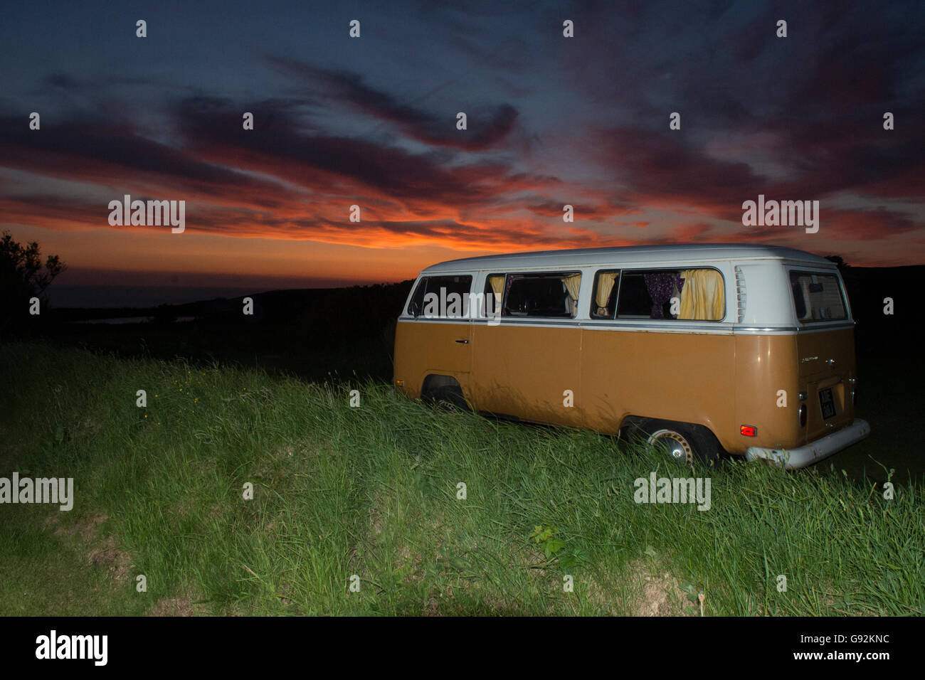 A 1971 VW camper van is pictured as the sun sets Stock Photo - Alamy