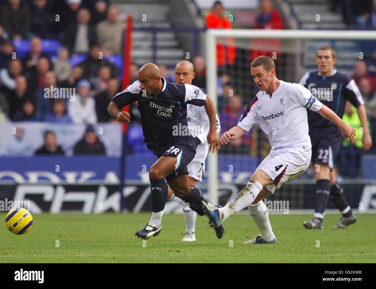 Manchester City's Trevor Sinclair pulls away from Bolton Wanderer's ...