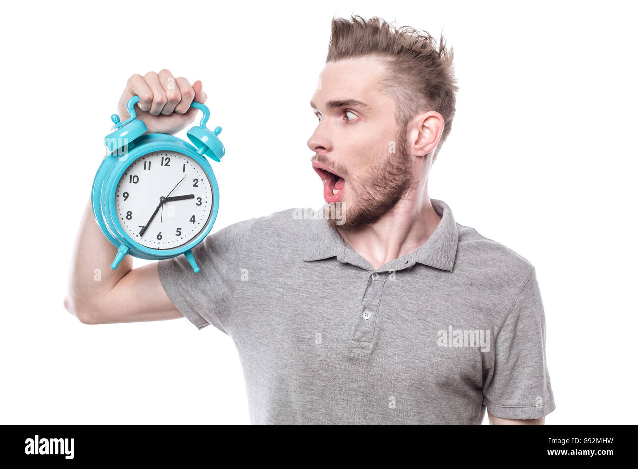 Funny concept for man with windblown mouth. Man holding alarm clock ...