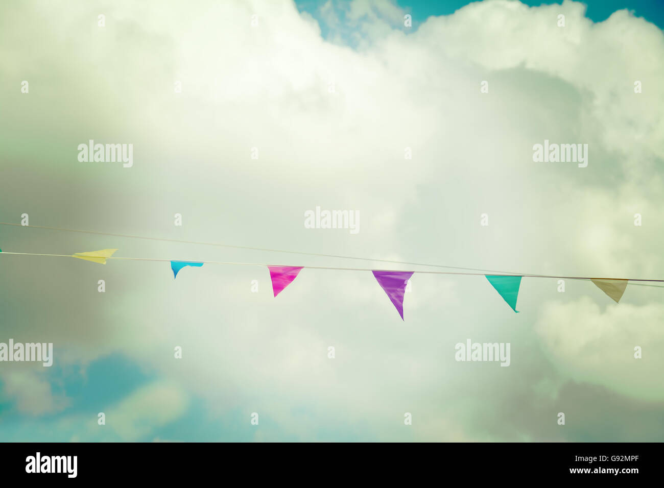 Colorful party flags wave in hi-res stock photography and images - Alamy