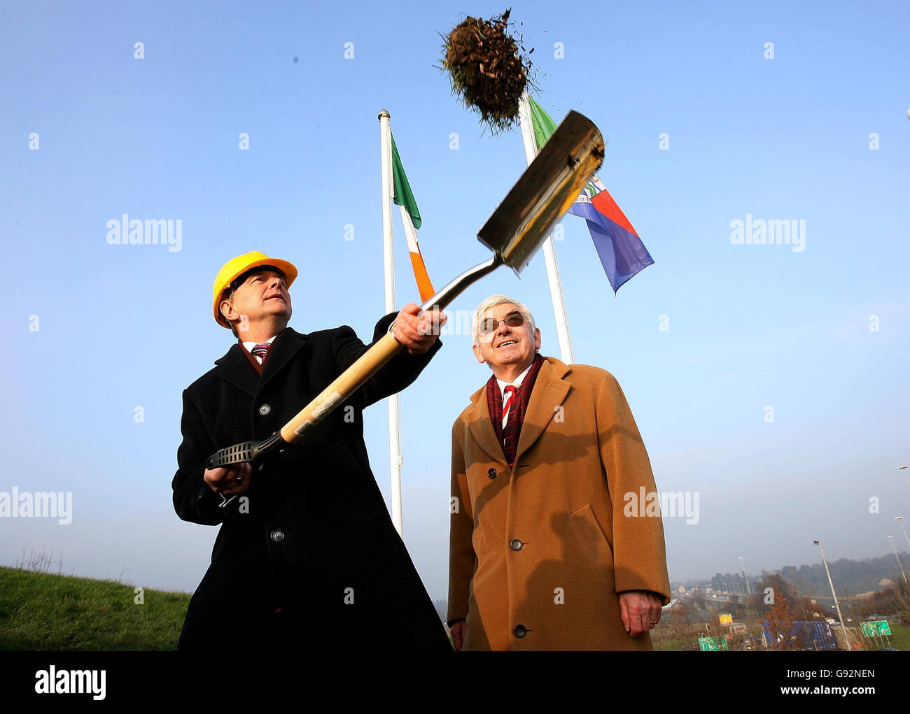 Transport Minister Martin Cullen TD flings the sod with Peter Malone ...