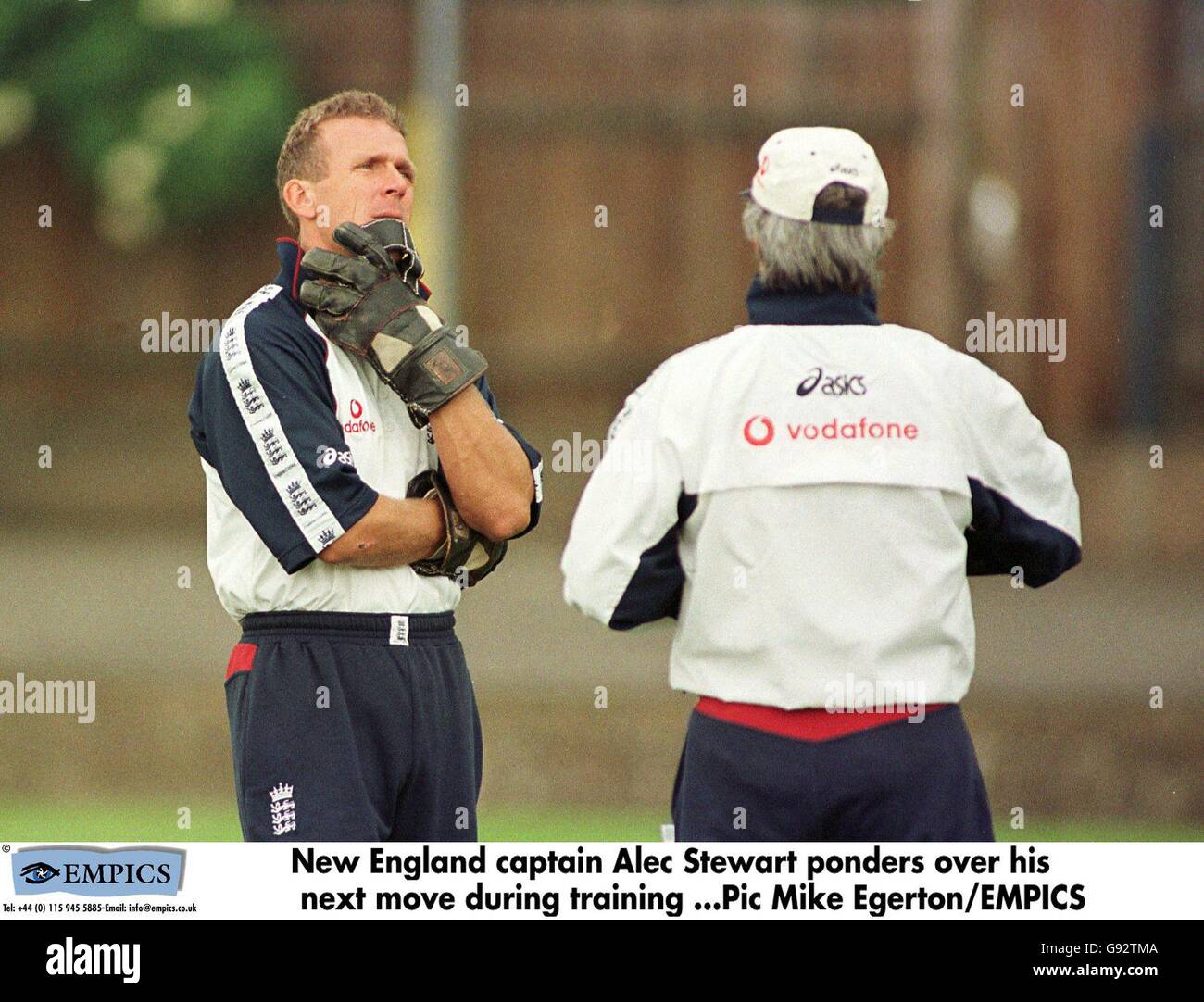 New England captain Alec Stewart ponders over his next move during ...
