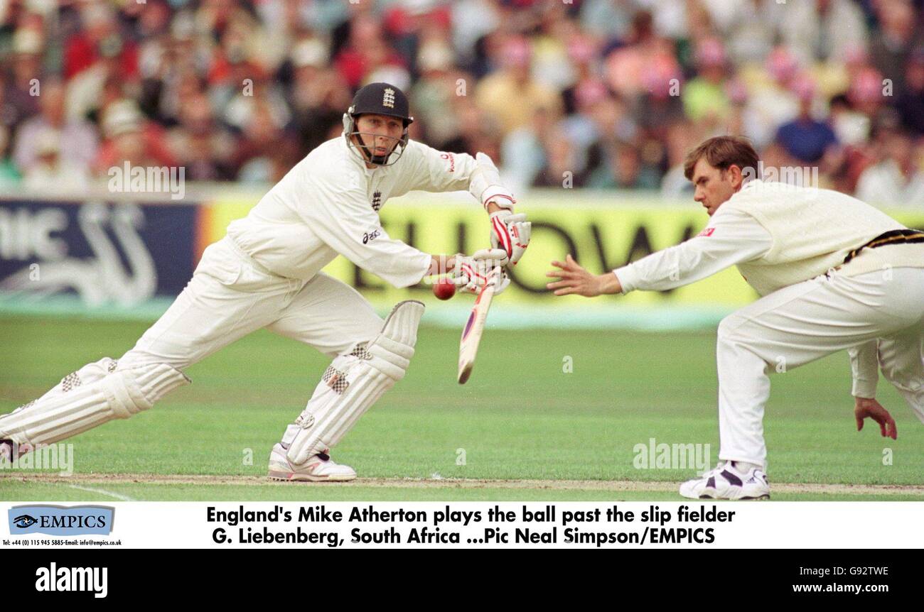England's Mike Atherton (left) plays the ball past the slip fielder Gerhardus Liebenberg of ...