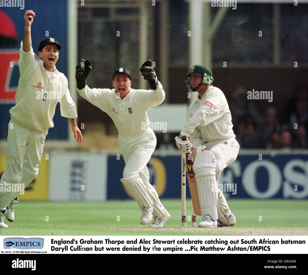 England's Graham Thorpe (left) and Alec Stewart (centre) celebrate ...