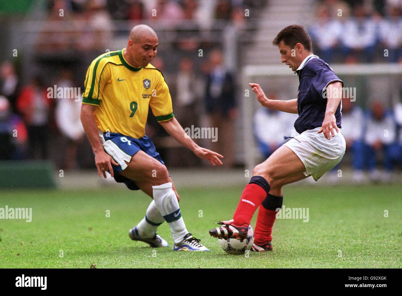Scotland's John Collins (right) and Brazil's Ronaldo (left) battle for ...