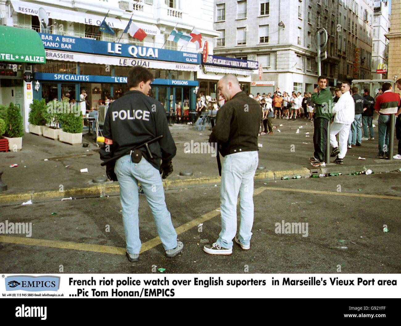 French riot police watch over English suporters in Marseille's Vieux ...