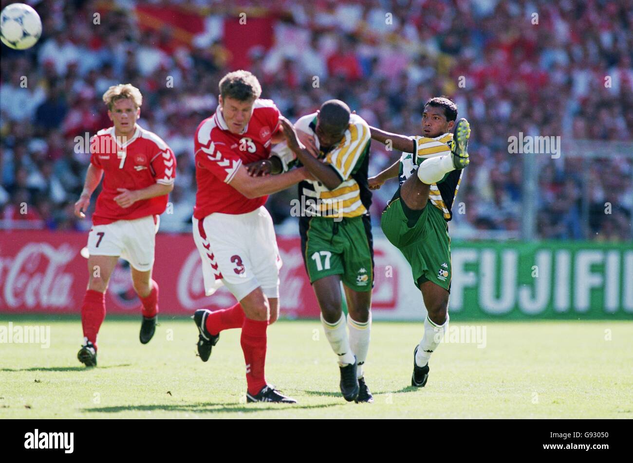 South Africa's Brendan Augustine (right) shoots as Denmark's Marc ...