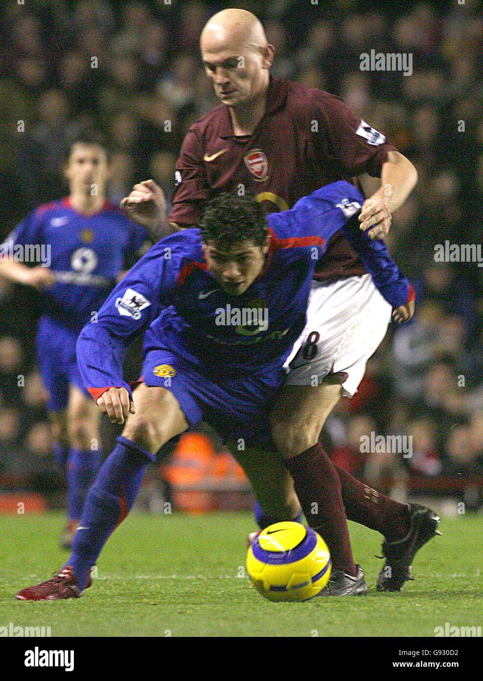 Arsenals pascal cygan brings down manchester uniteds cristiano ronaldo ...