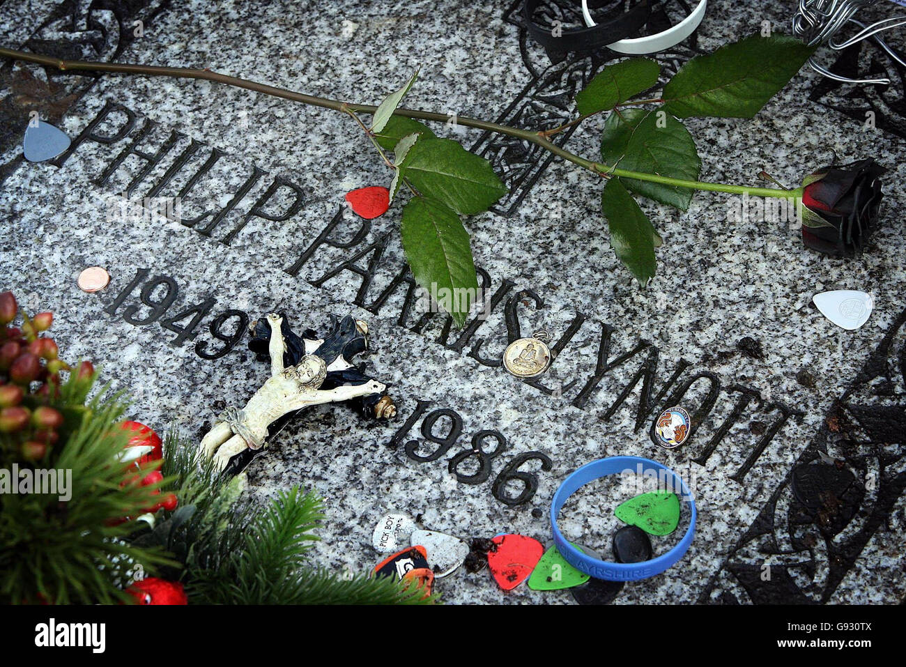 A rose is layed on top of Phil Lynott's grave in St Fintan's cemetery ...