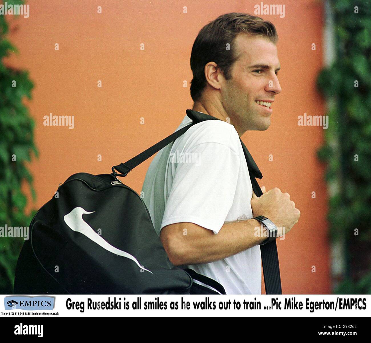 Tennis, Wimbledon Championship. Greg Rusedski is all smiles as he walks ...