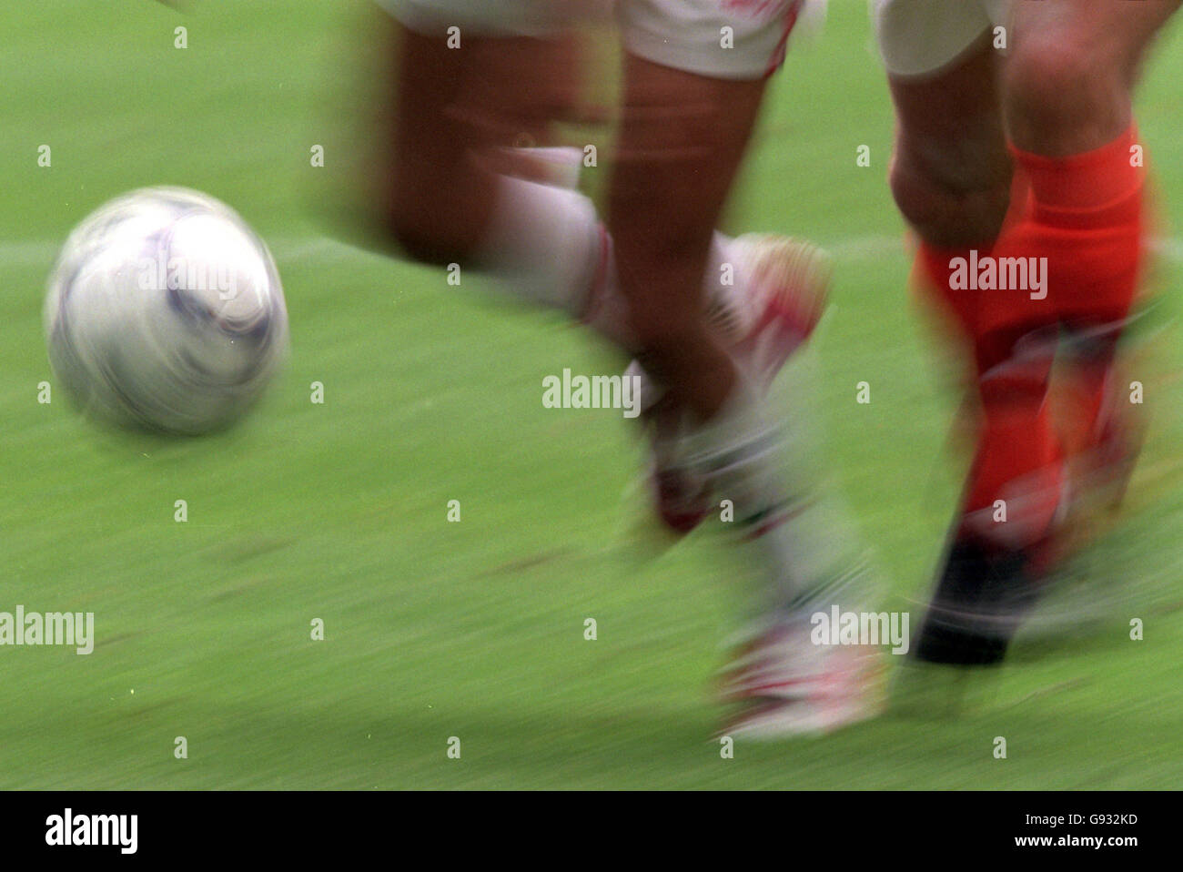 Two players chasing the ball hi-res stock photography and images - Alamy