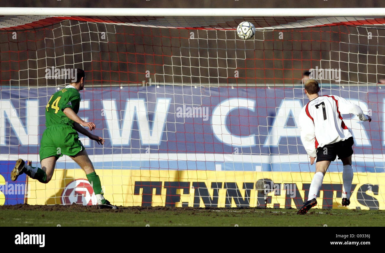 Clyde's Craig Bryson (R) scores against Celtic during the Tennents ...