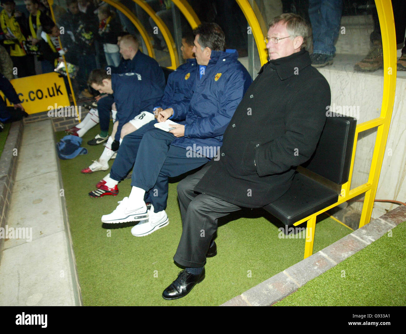 Manchester united manager sir alex ferguson on the bench hi-res stock ...