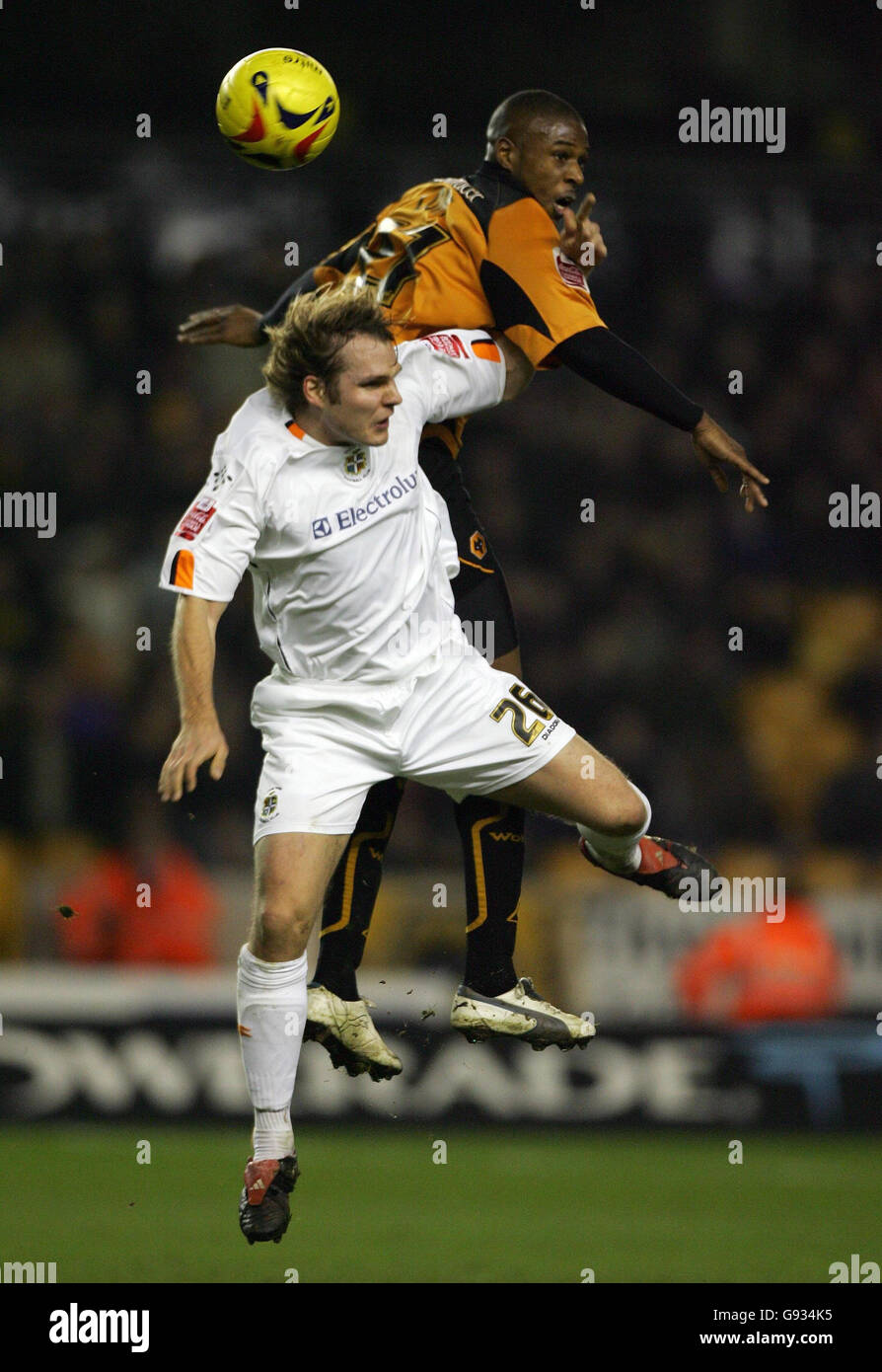 Wolverhampton Wanderers' Carl Cort (top) wins a header against Luton ...