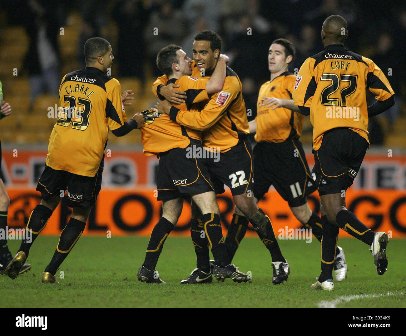 Wolverhampton Wanderers' Mark Davies (second left) is hugged by Tom ...
