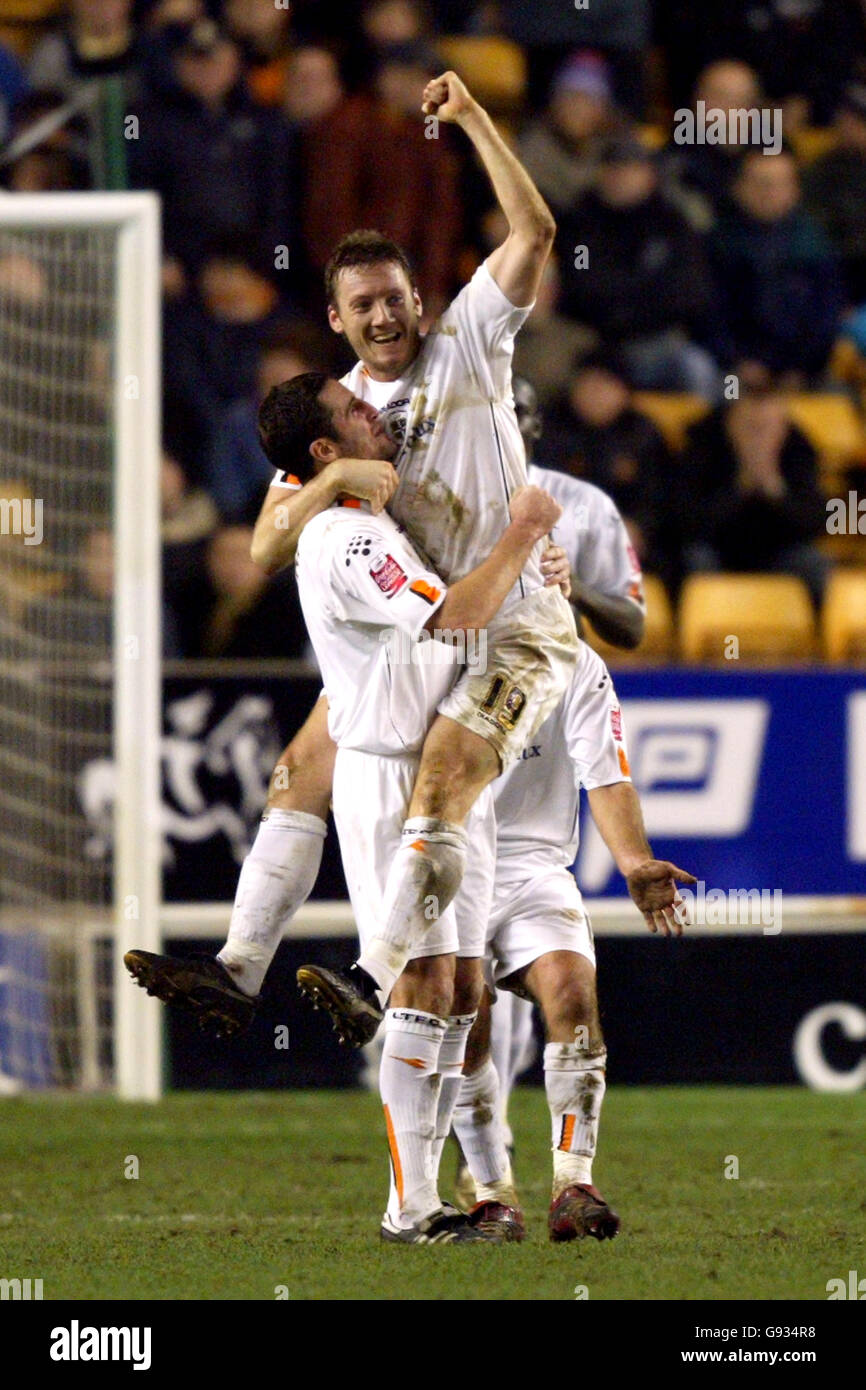 Luton Town's Steve Howard (top) celebrates scoring the equalising goal ...