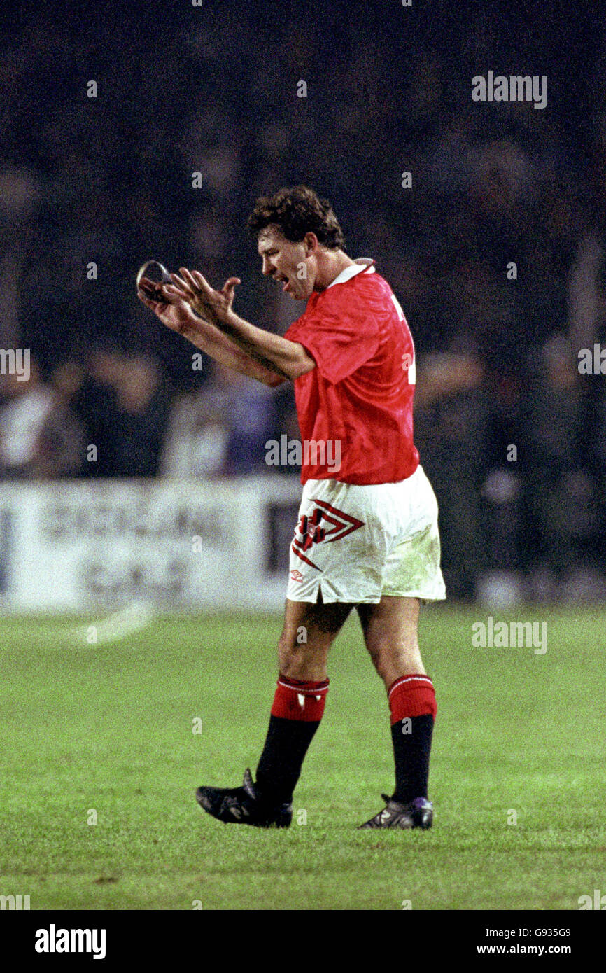 Manchester United captain Bryan Robson shows his frustration as his ...