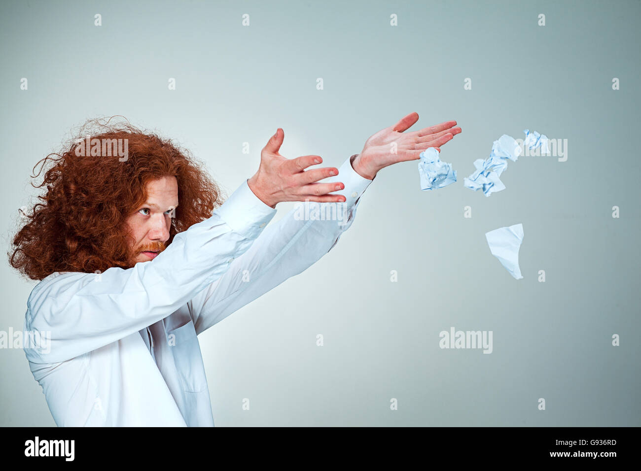 Angry man tear out paper Stock Photo - Alamy
